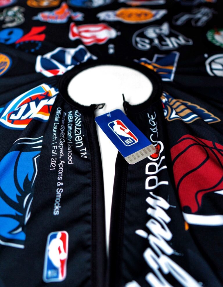 Holiday Gift Guide: The multi-logo NBA Barber cape | NBA.com
