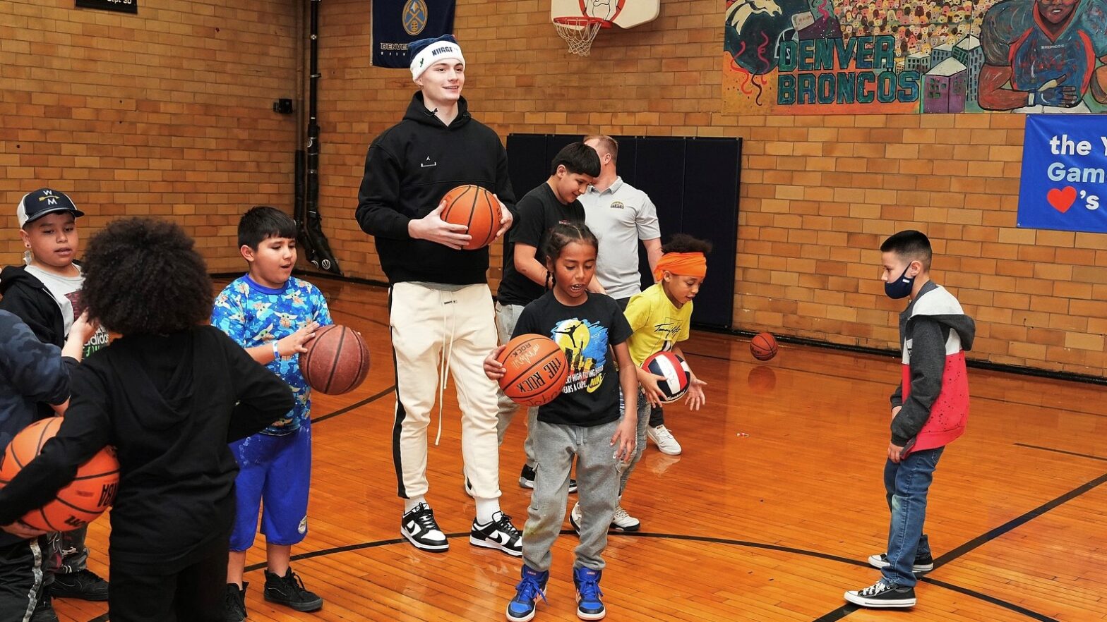 Nuggets 'bring a good holiday spirit' to Denver Boys & Girls Club ...