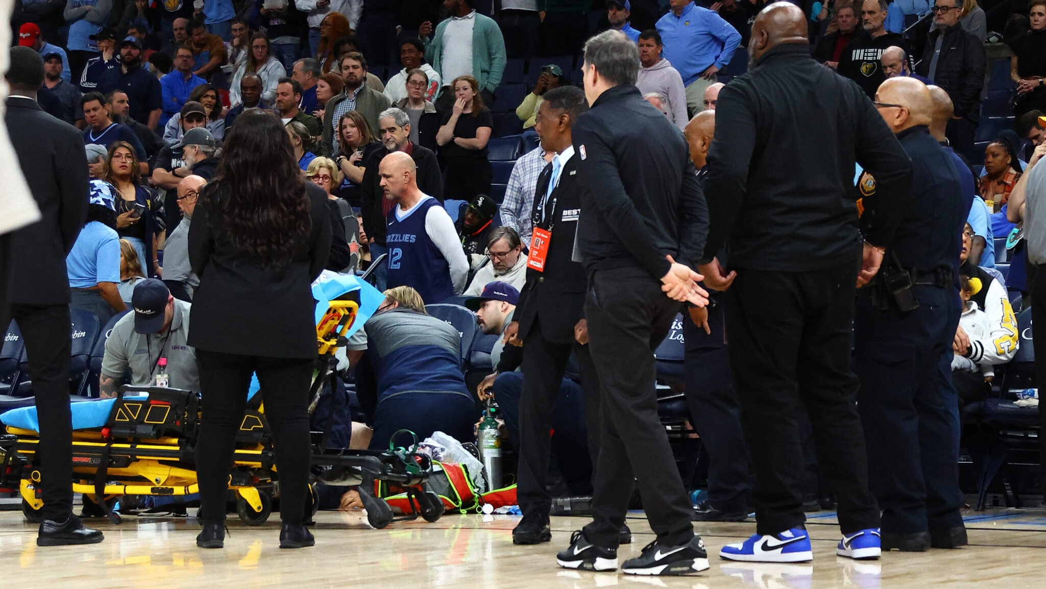 Medics attend to fan who collapsed courtside at Spurs, Grizzlies game ...