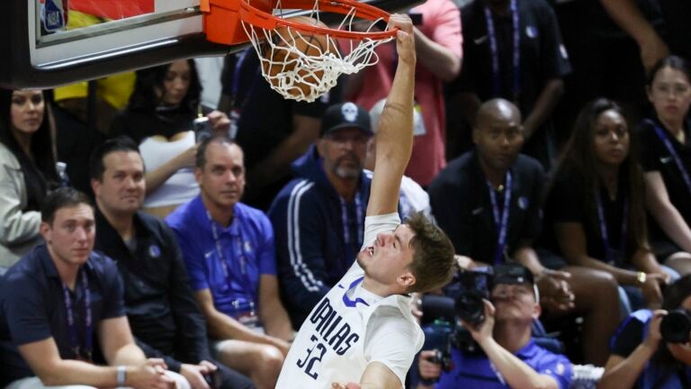 Mavericks rookie Cooper Flagg all business as he makes pro debut at NBA ...