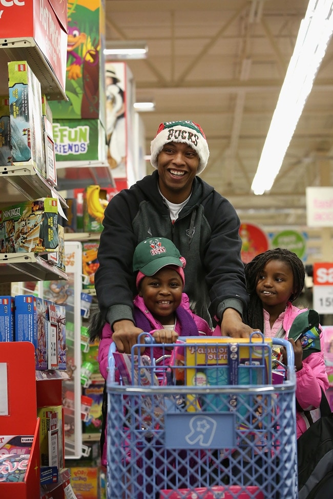 Caron Butler and O.J. Mayo Spread Holiday Cheer Photo Gallery | NBA.com