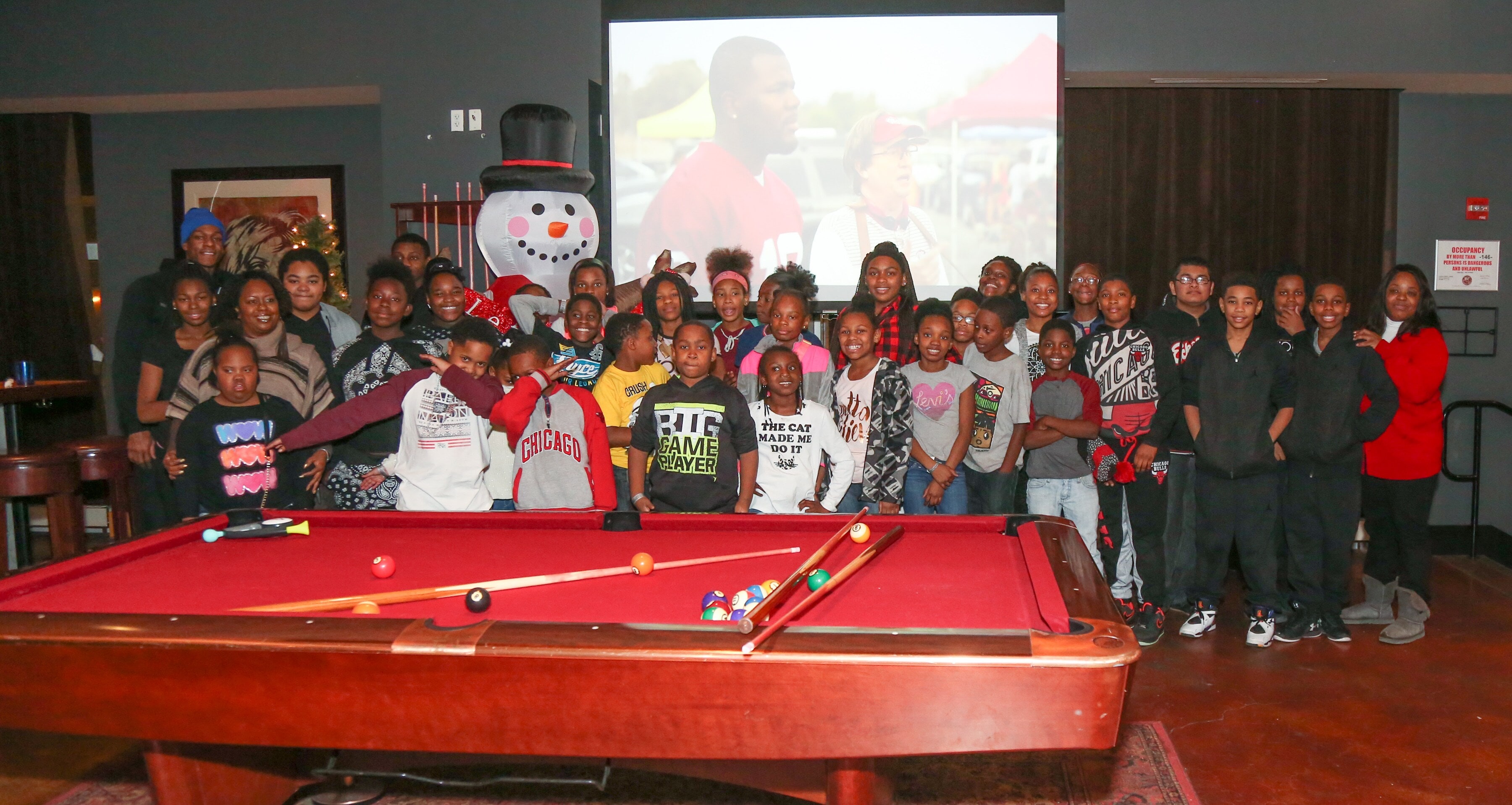 RAJON RONDO HOSTS STUDENTS FOR HOLIDAY BOWLING CELEBRATION | Chicago Bulls
