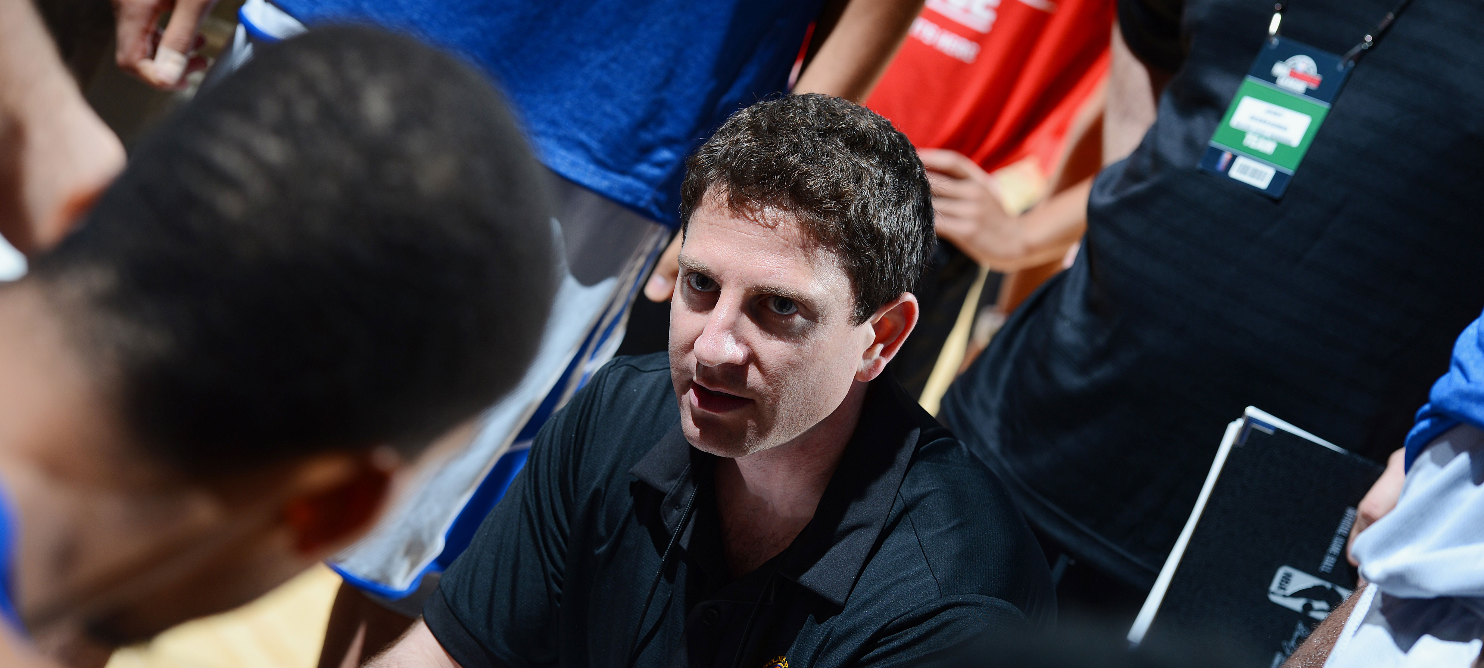Darren Erman speaks to coaches at clinic in Pelicans practice facility ...