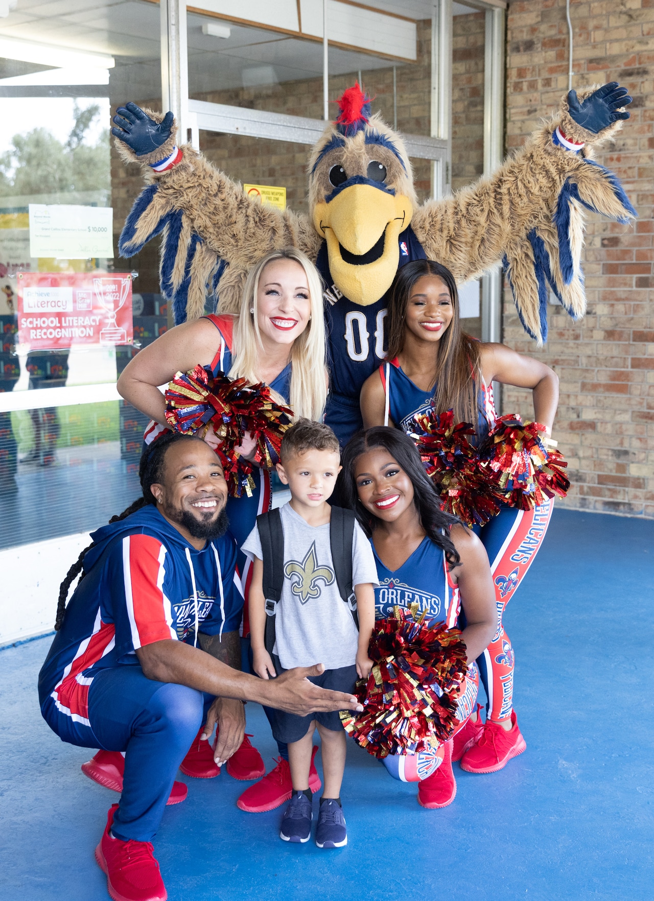 Photos: Pelicans, Shell provide reading kits for Grand Caillou ...