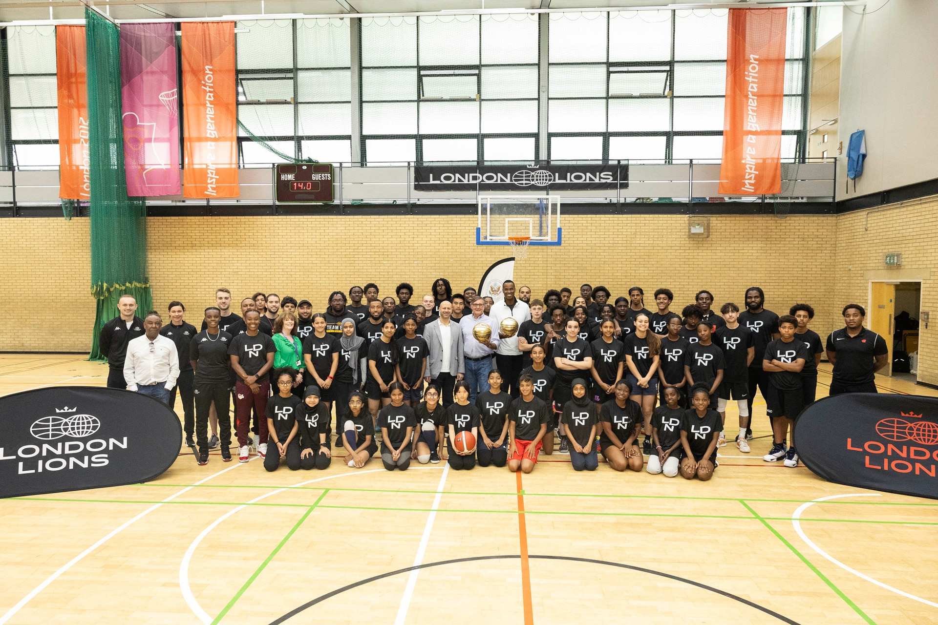 Photos: Jarron Collins serves as youth camp coach with London Lions ...