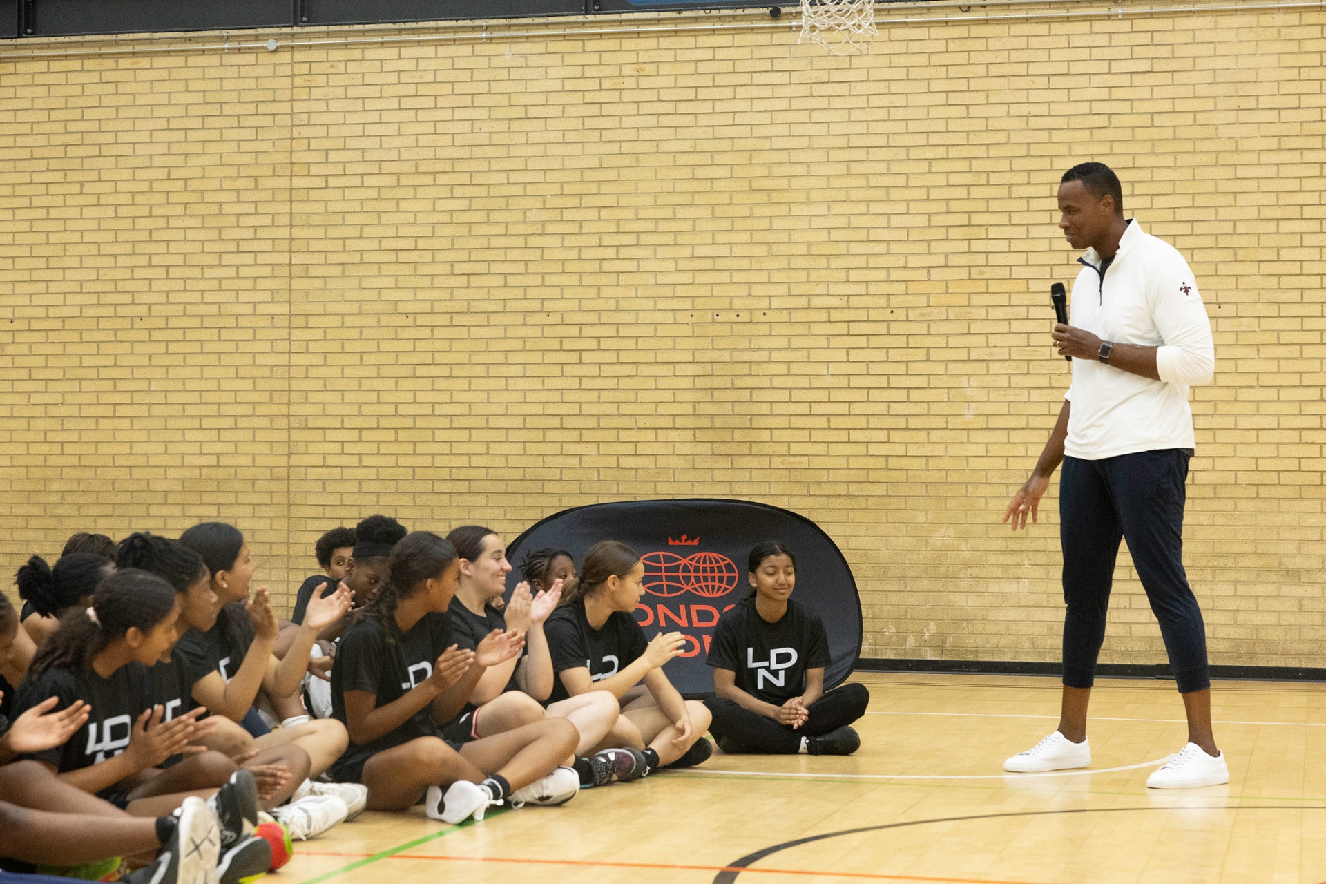 Photos: Jarron Collins serves as youth camp coach with London Lions ...