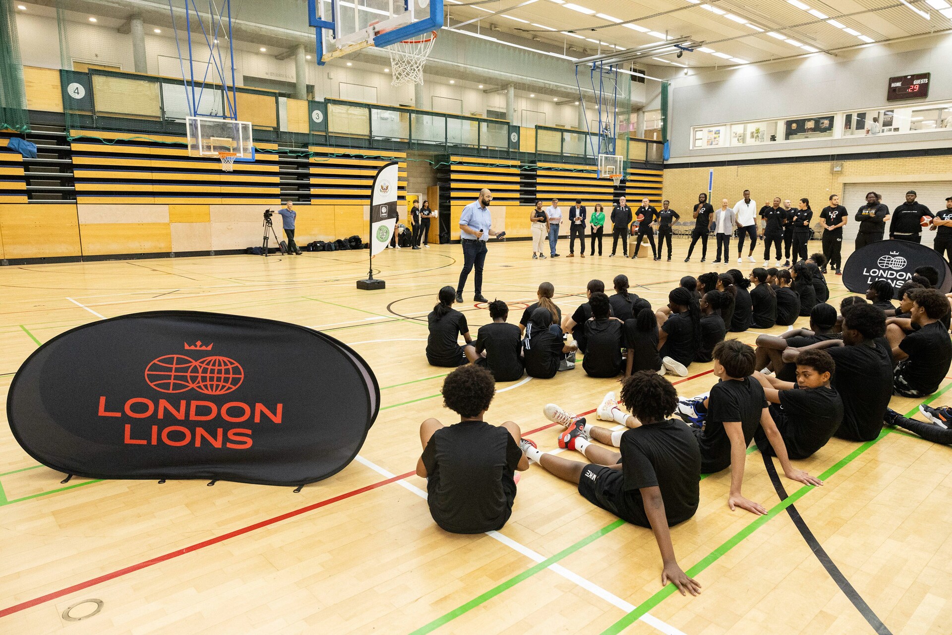 Photos: Jarron Collins serves as youth camp coach with London Lions ...