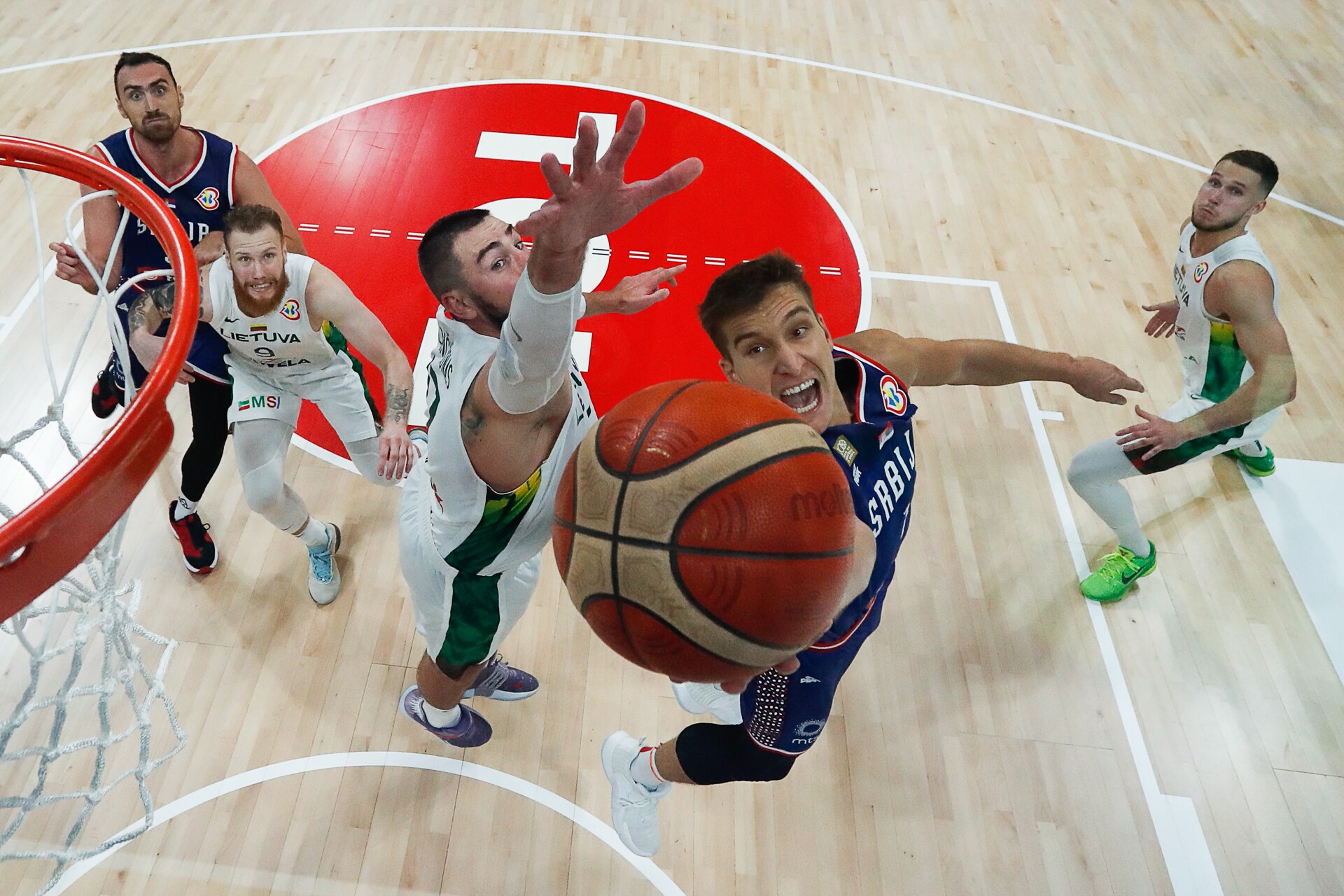 Photos: Valančiūnas, Lithuania eliminated after 68-87 loss to Serbia in ...