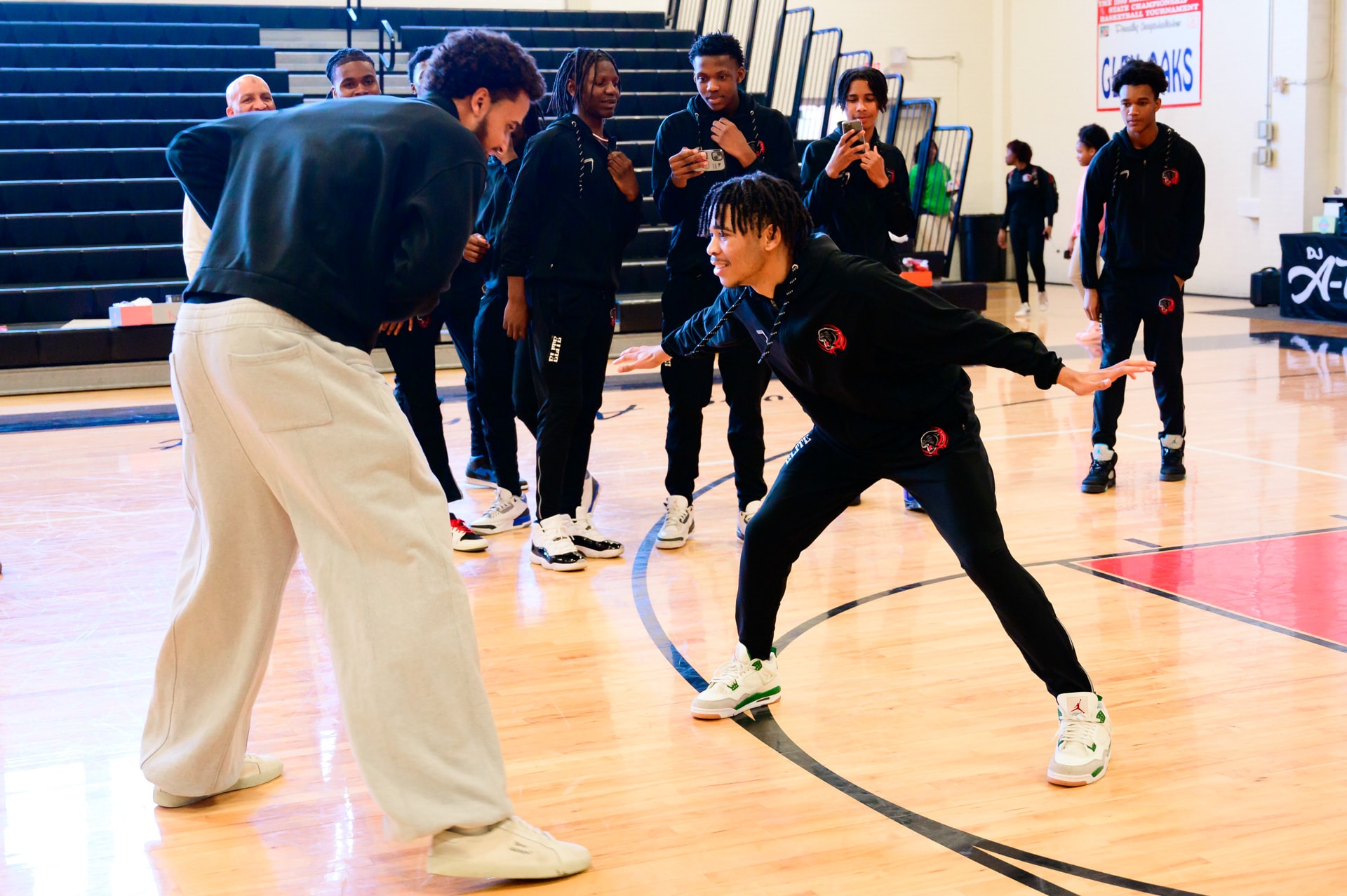 Photos: Jeremiah Robinson-Earl and his father gift basketball shoes to ...