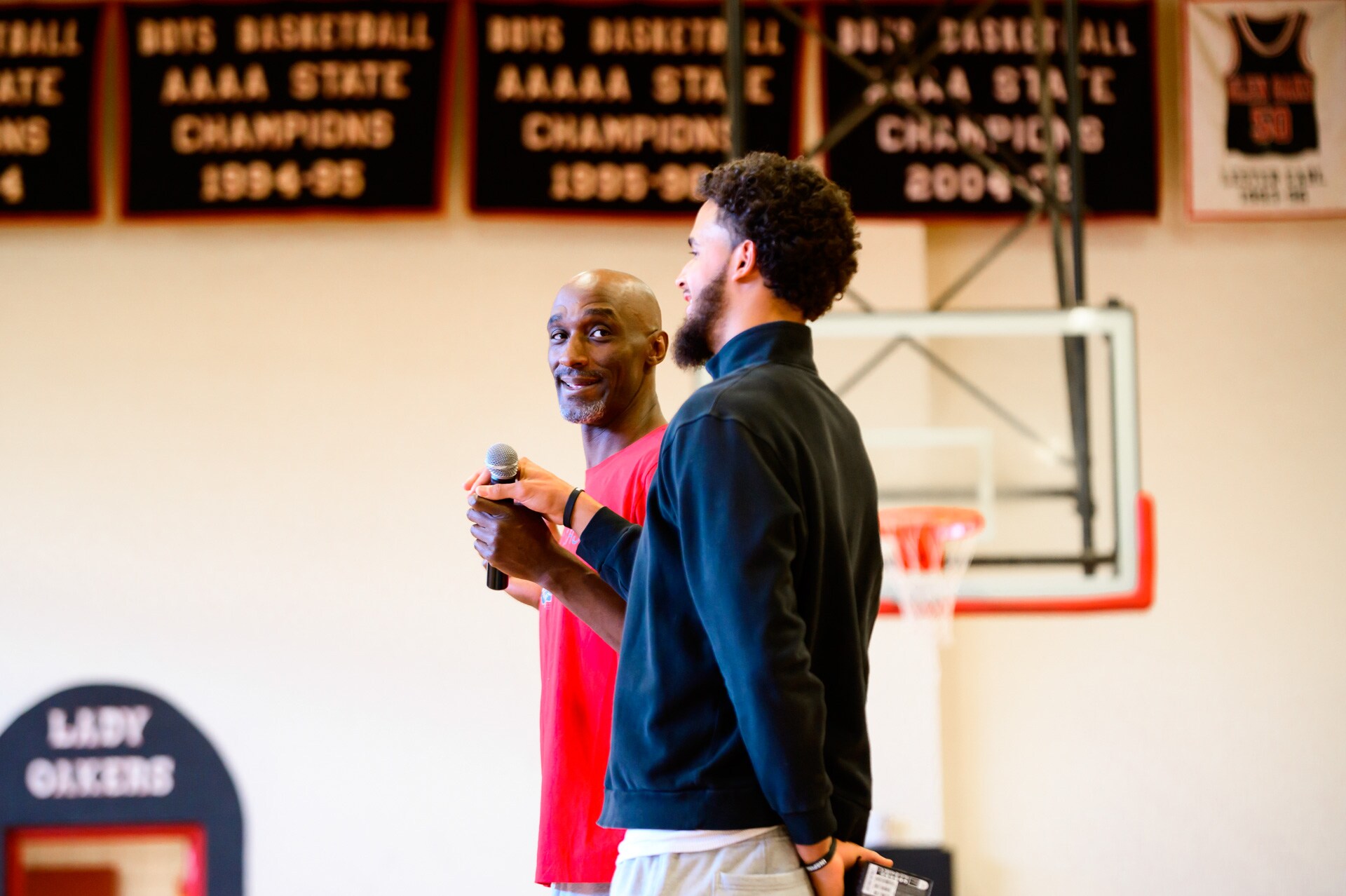 Photos: Jeremiah Robinson-Earl and his father gift basketball shoes to ...