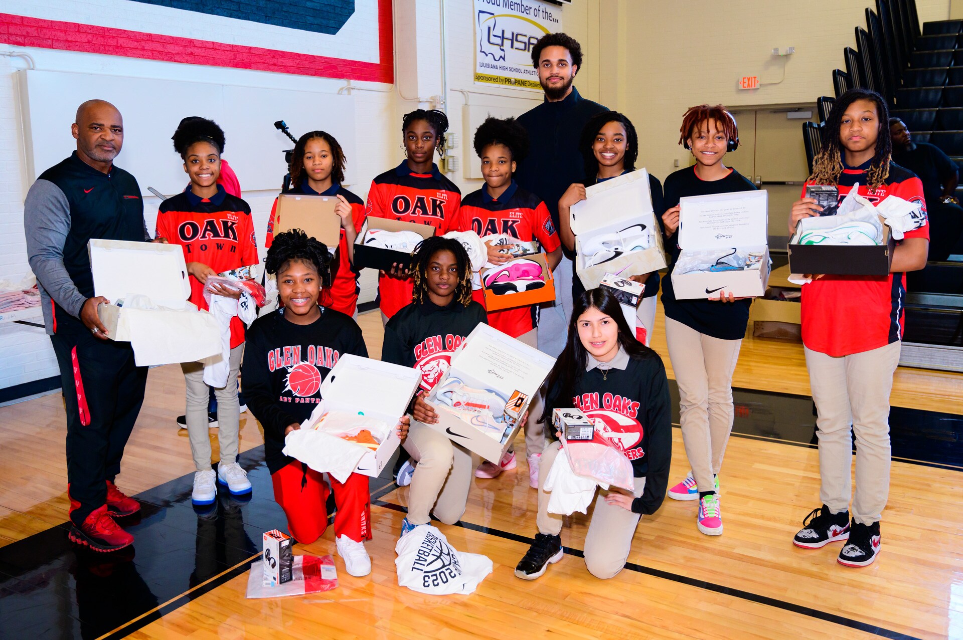 Photos: Jeremiah Robinson-Earl and his father gift basketball shoes to ...