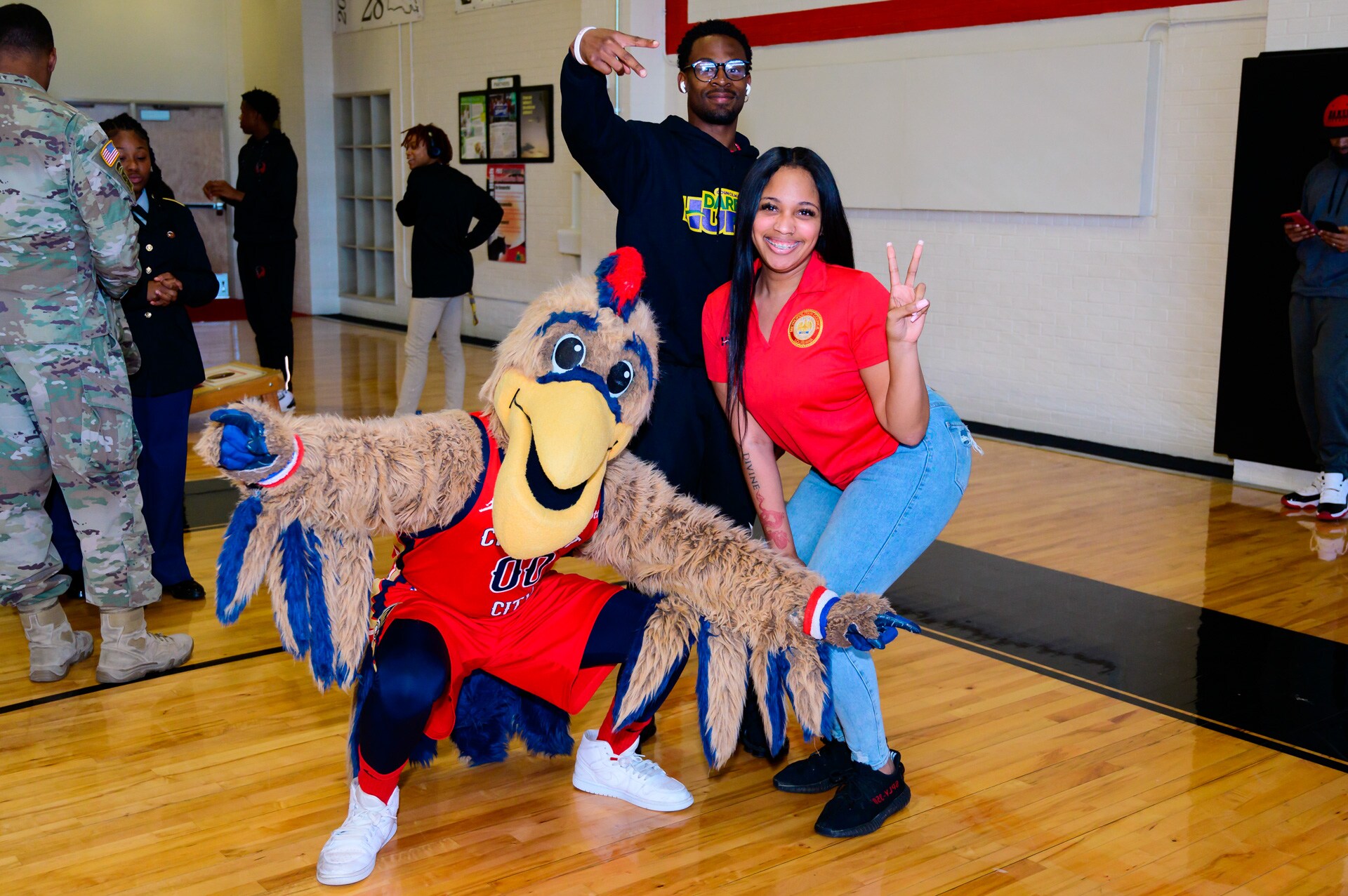Photos: Jeremiah Robinson-Earl and his father gift basketball shoes to ...