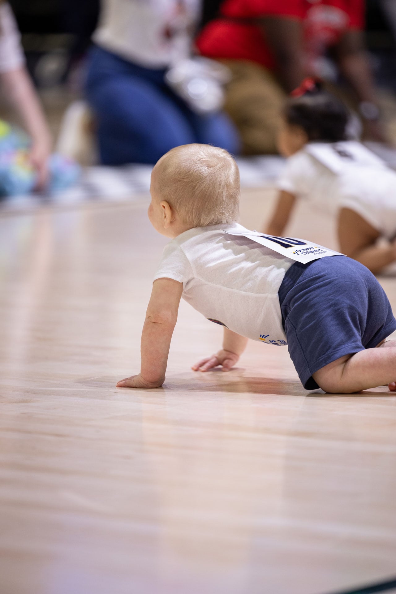 Photos: Baby Crawl Race 2024 | Pelicans vs. Celtics Entertainment 3/30 ...