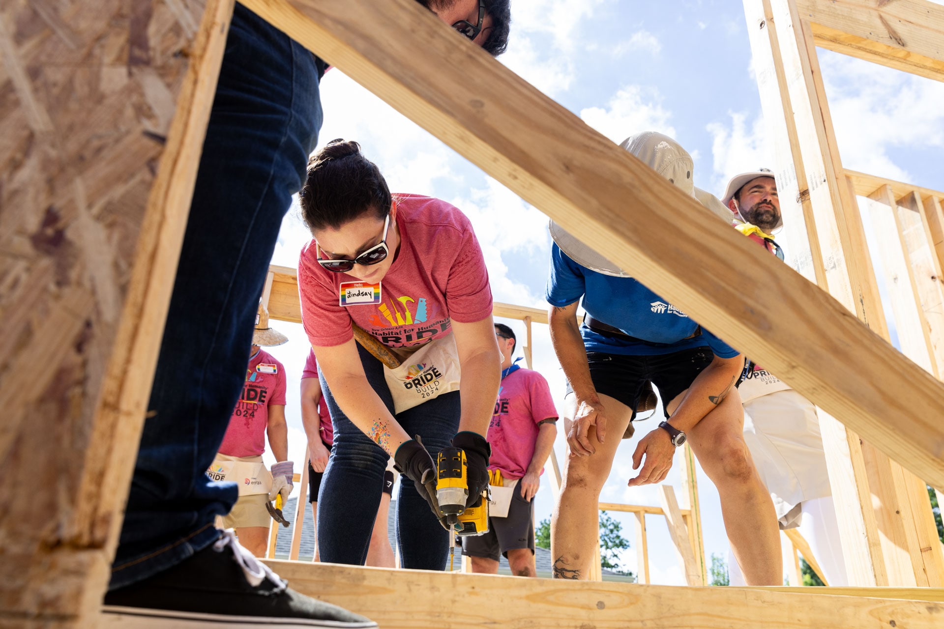 Photos: Pelicans, Saints staff volunteer at Habitat for Humanity PRIDE build Photo Gallery | NBA.com