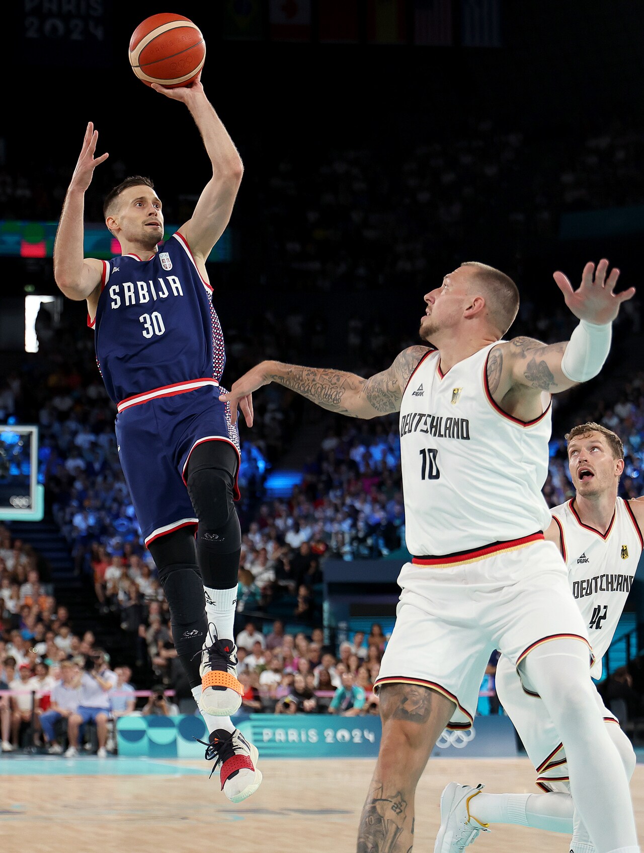 Pelicans in Paris: Daniel Theis, Germany lose to Serbia in Olympic ...