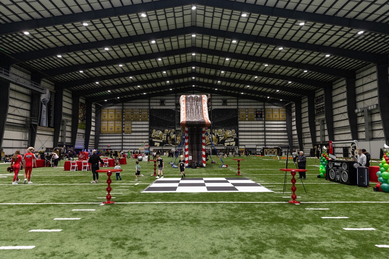 Photos: Pelicans, Saints host 2024 Holiday Huddle Kids & Crib Club ...