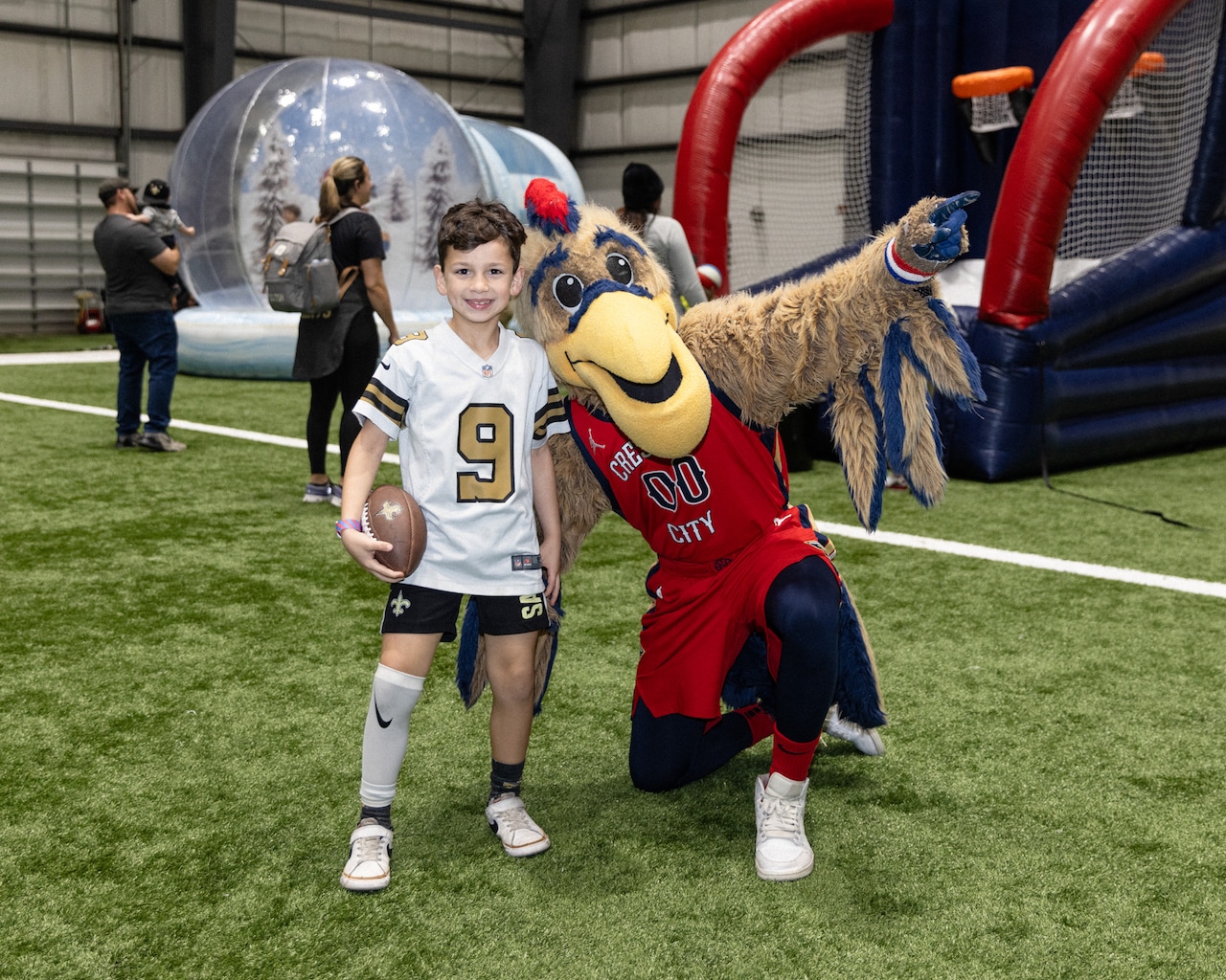 Photos: Pelicans, Saints host 2024 Holiday Huddle Kids & Crib Club ...