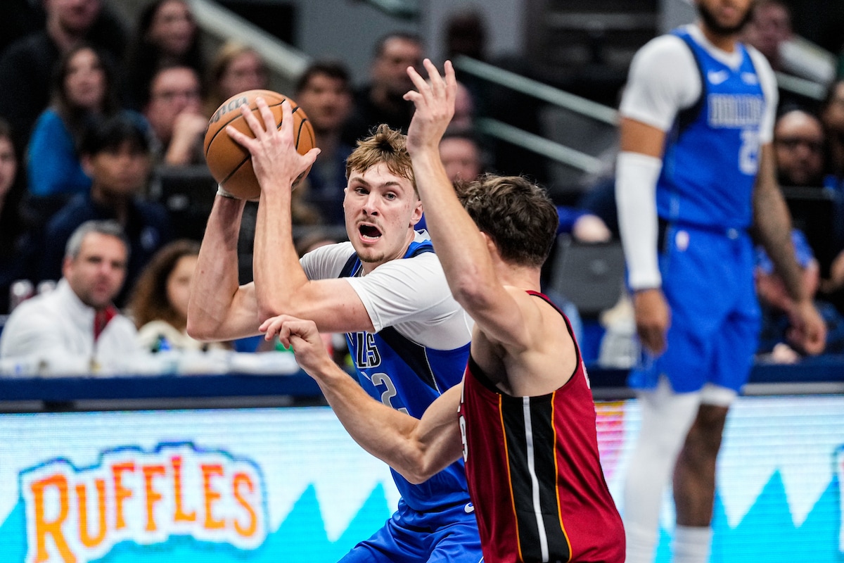 Winning streak reaches three as group effort leads Mavericks over Heat ...