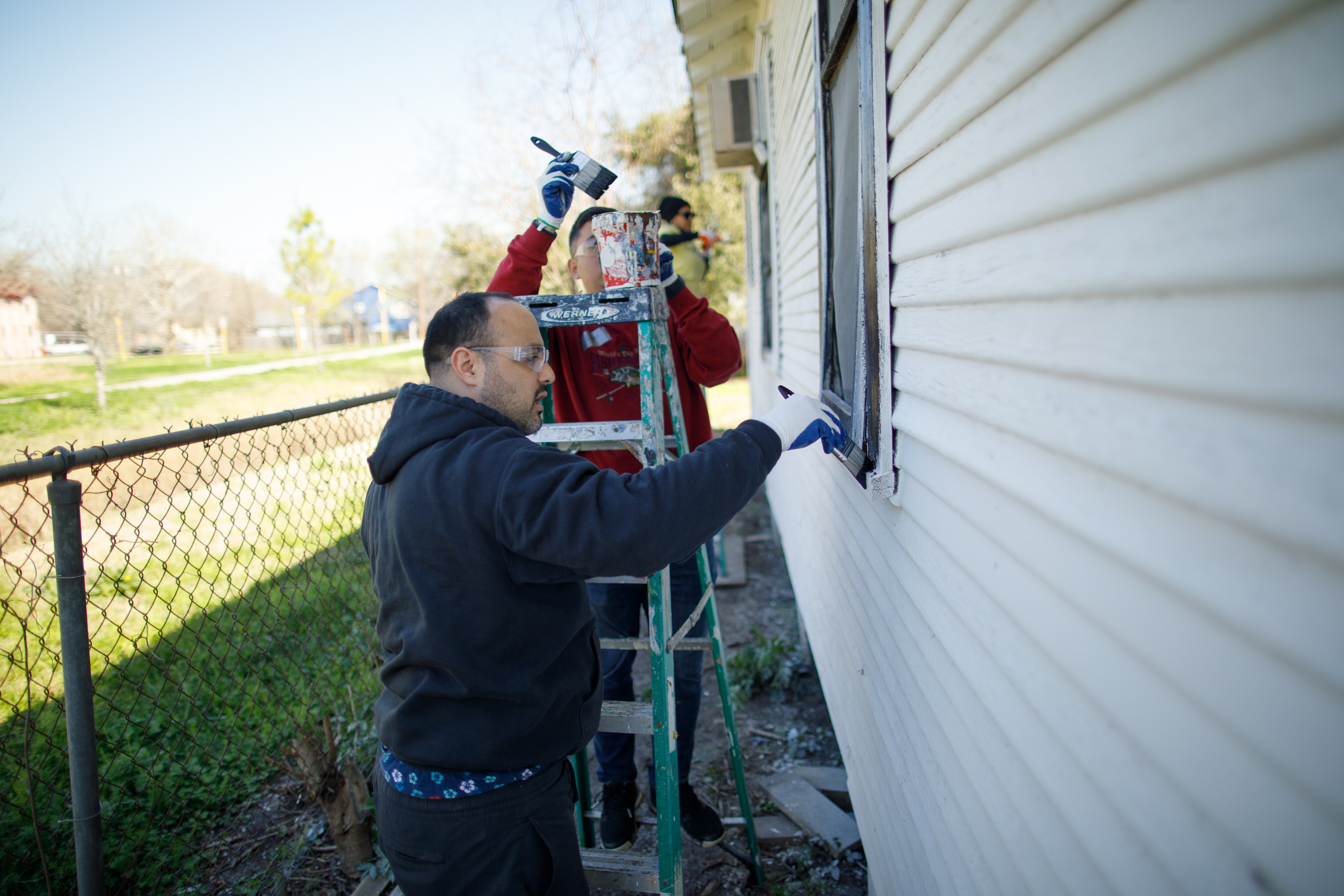Photos: The Rockets and Reliant partner with Rebuilding Together ...