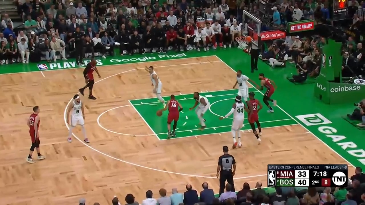 Martin drives to the rim and scores over Williams III