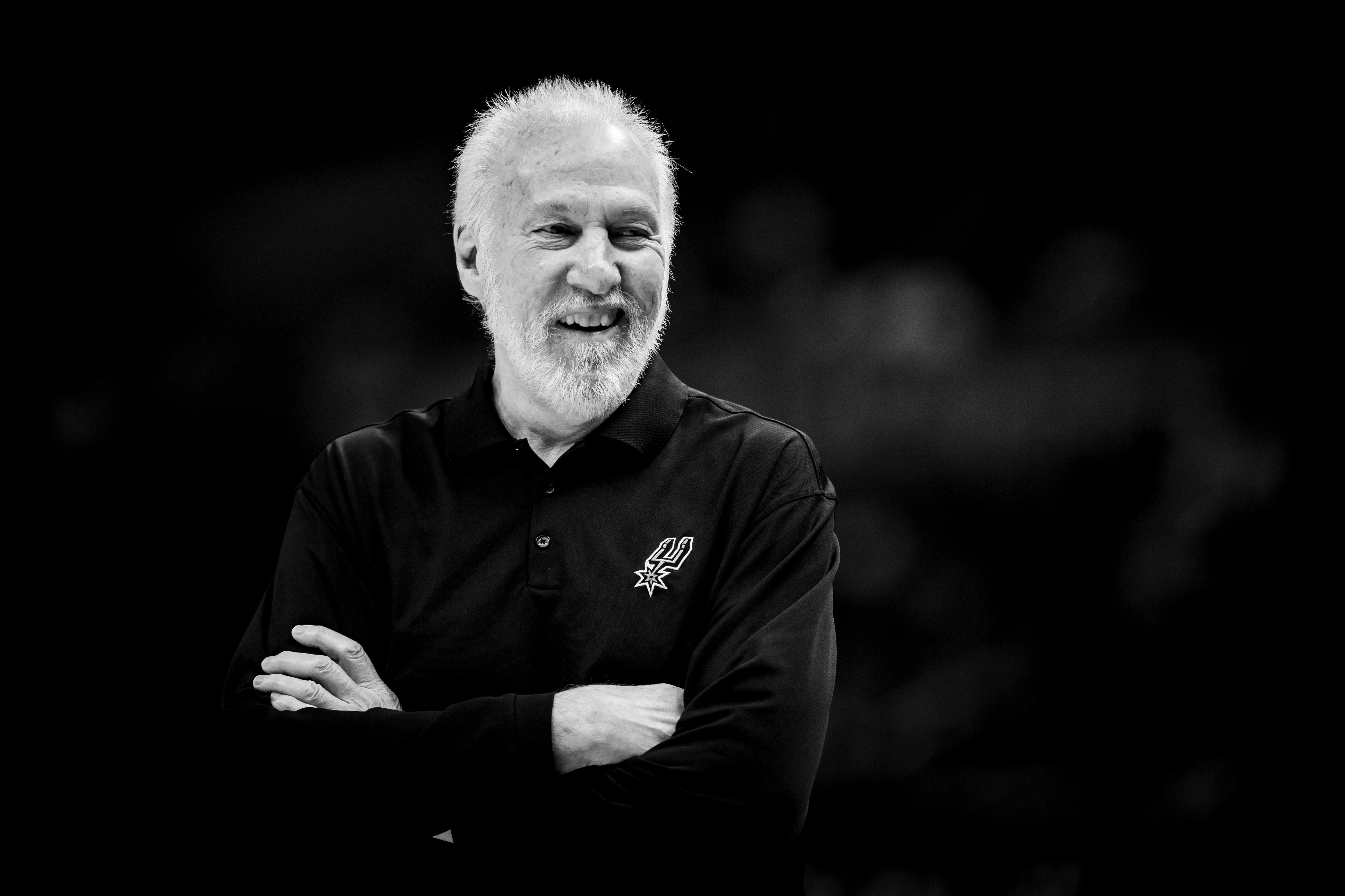 San Antonio Spurs Head Coach Gregg Popovich smiles as he looks to the ...