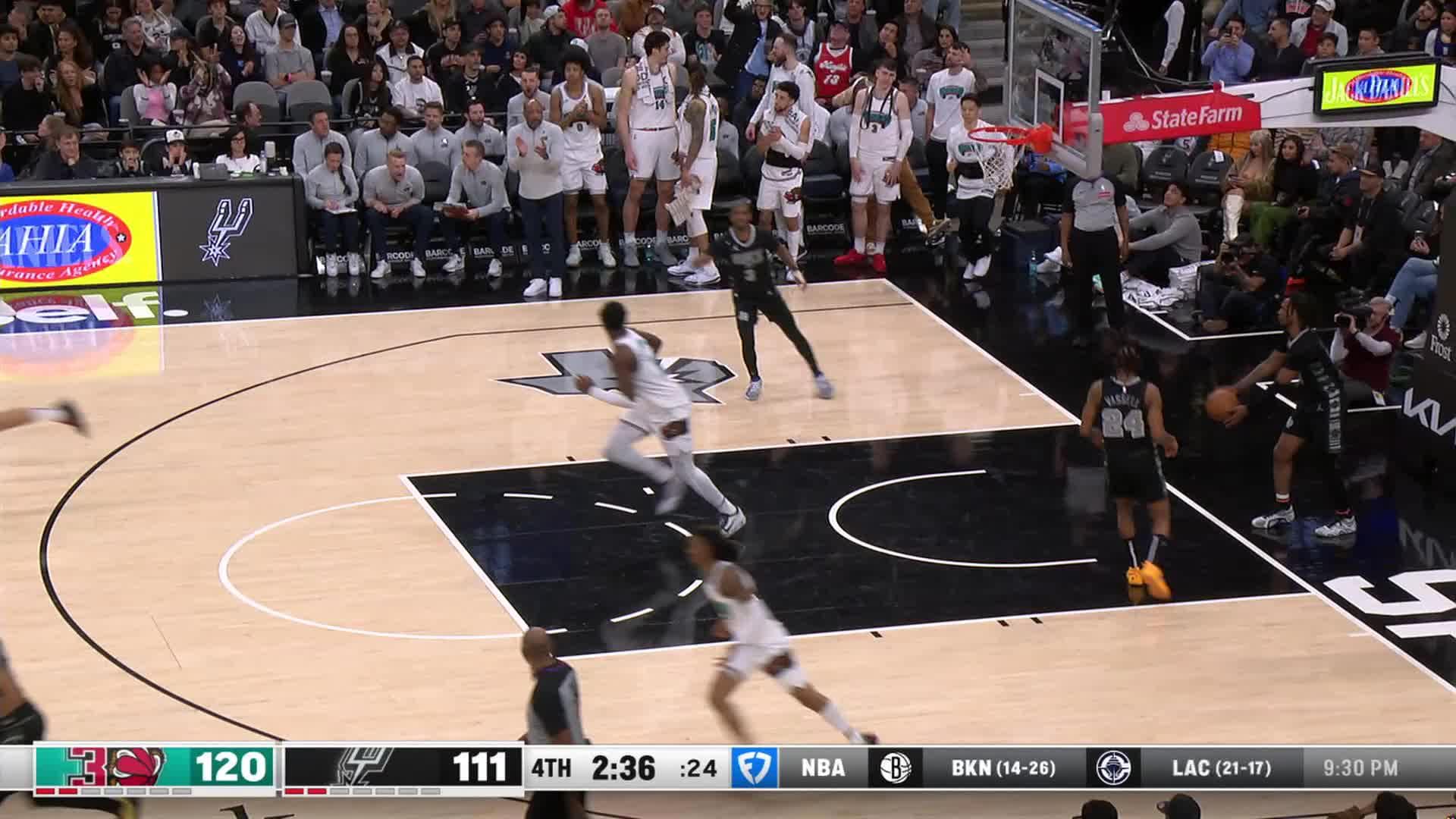 Ja Morant hits a ball fake and scoops in the layup