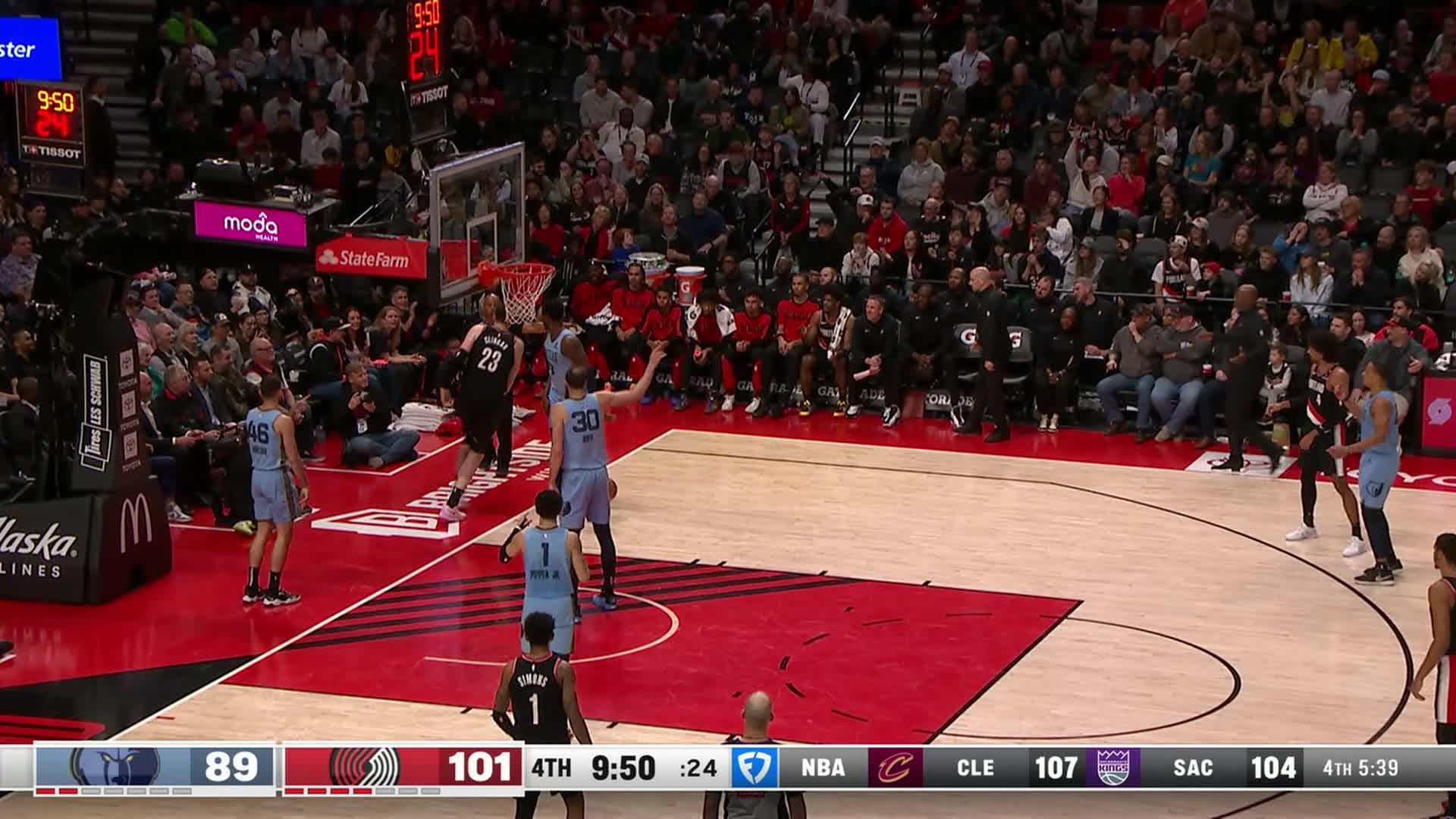 Jay Huff rises to block the shot